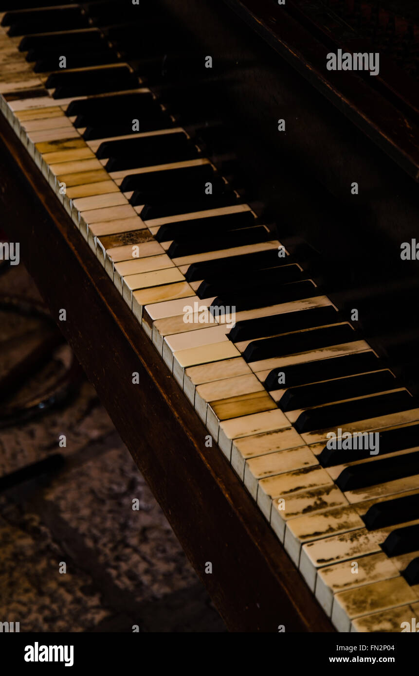detail of keyboard of old aged piano Stock Photo - Alamy