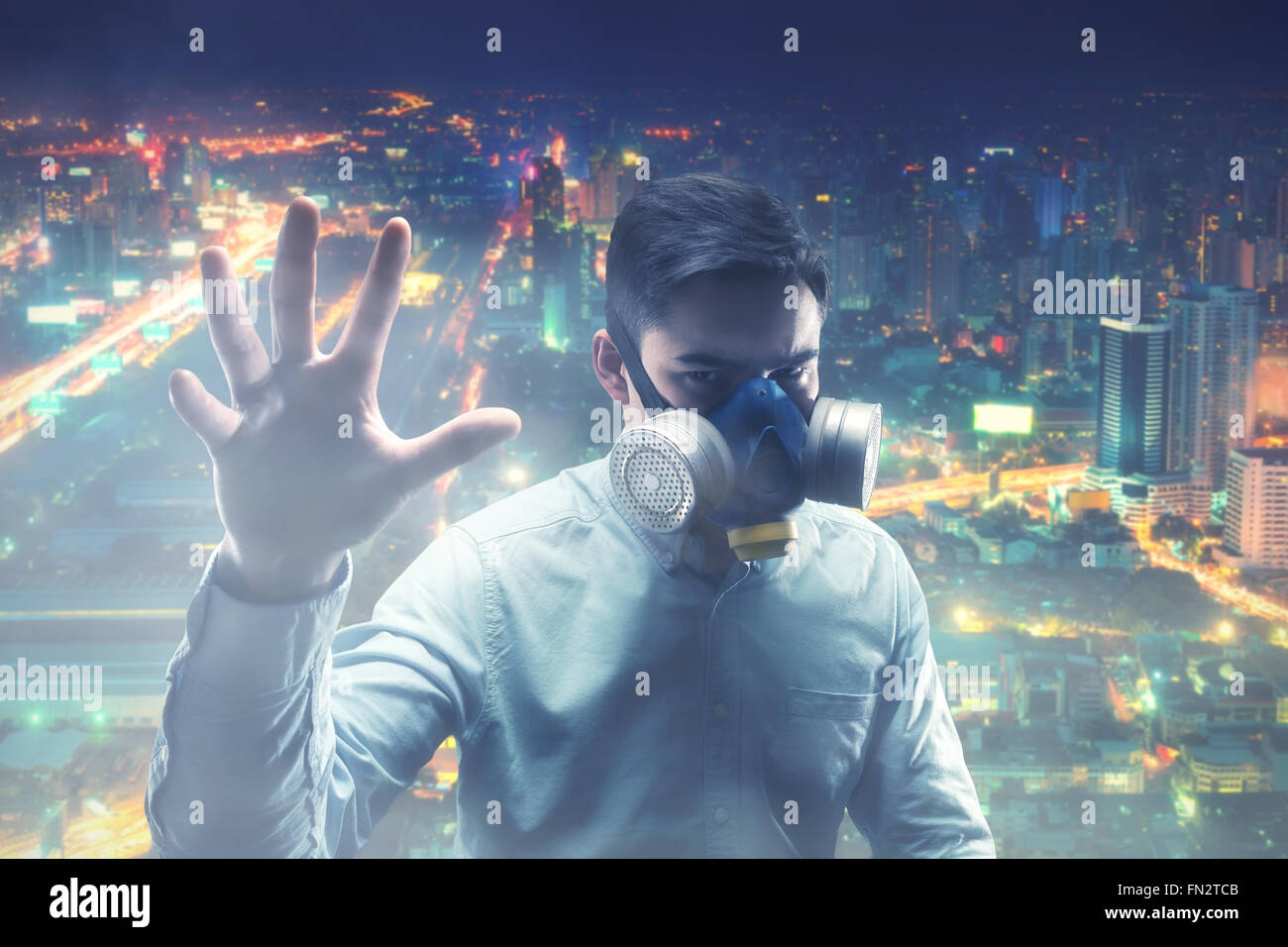 Young man in gas-mask Stock Photo - Alamy