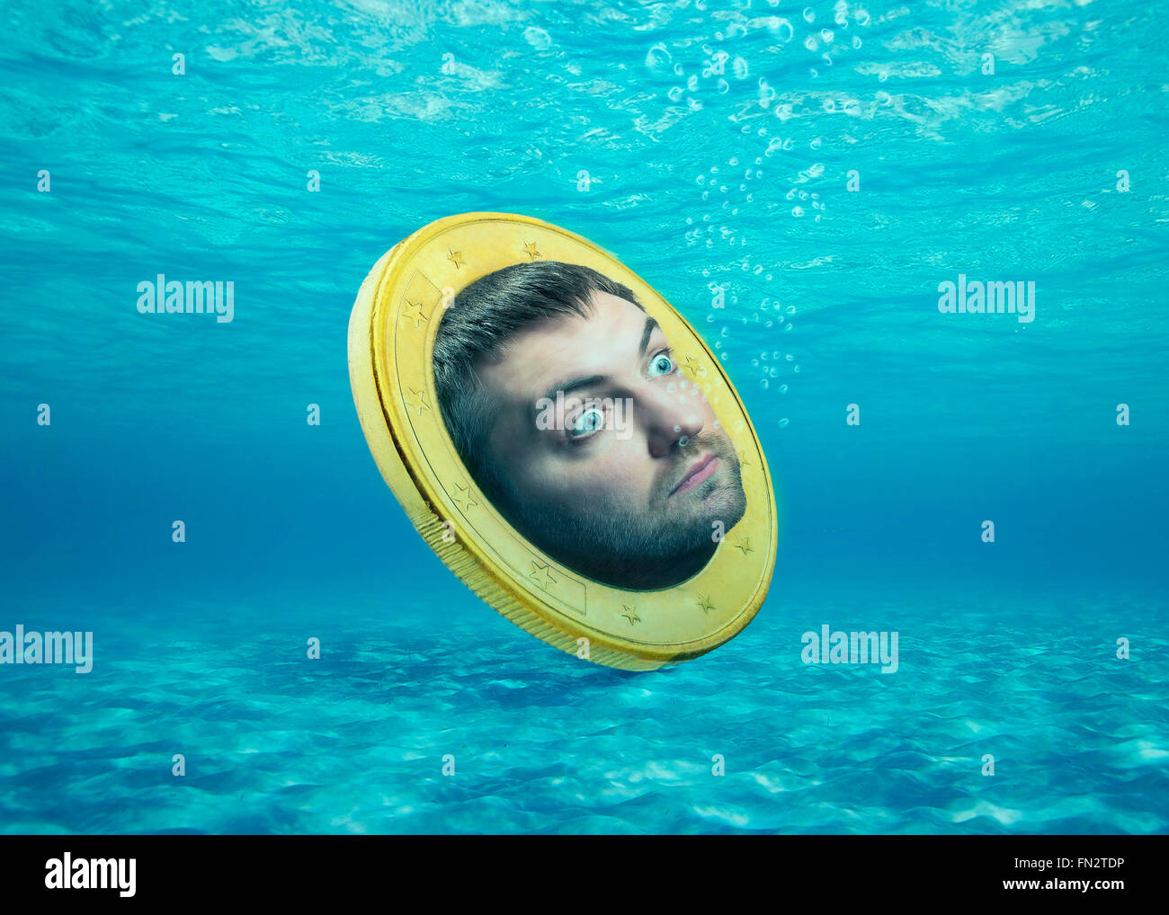 Human face in the coin Stock Photo - Alamy