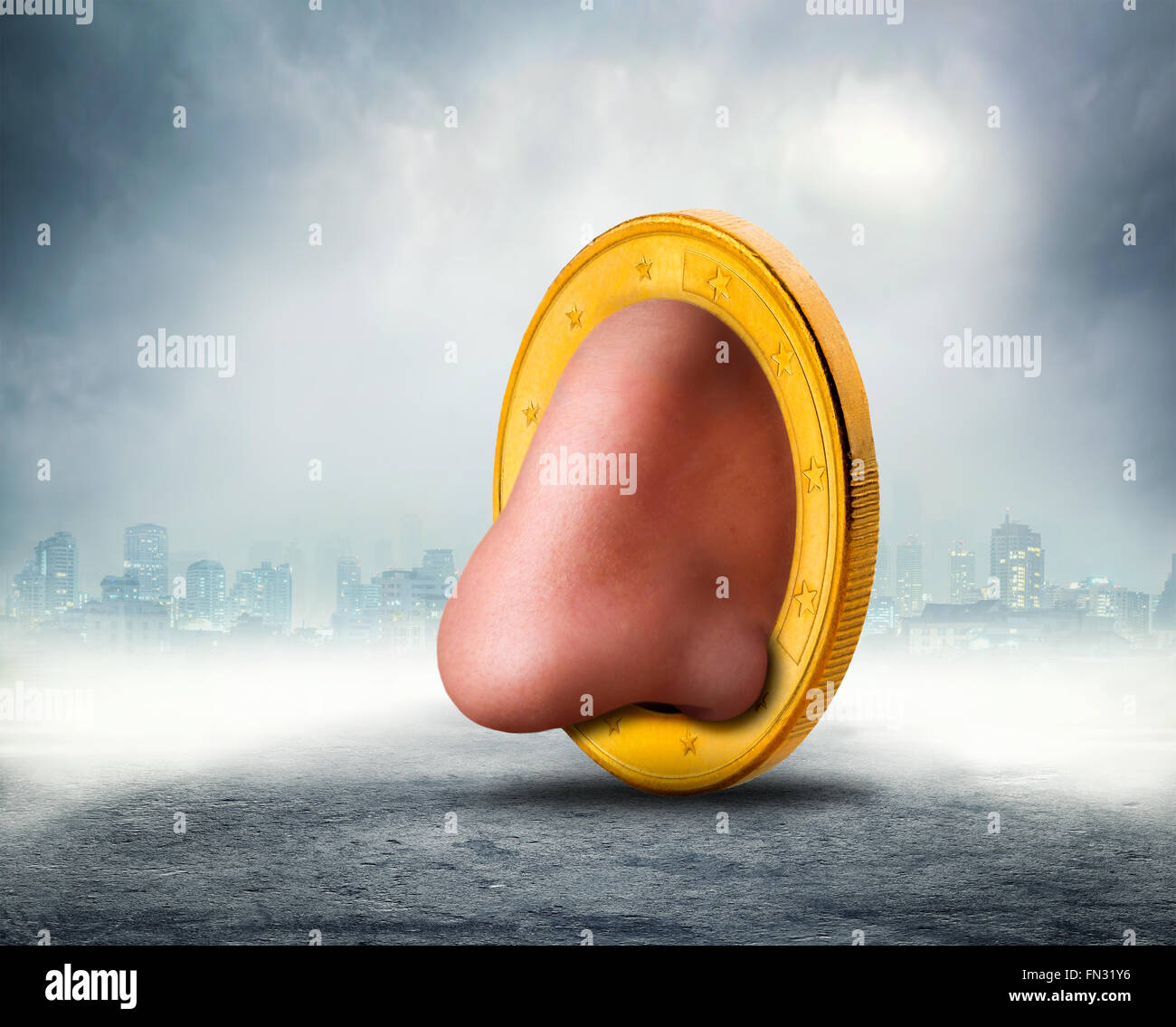 Human nose in the coin Stock Photo - Alamy