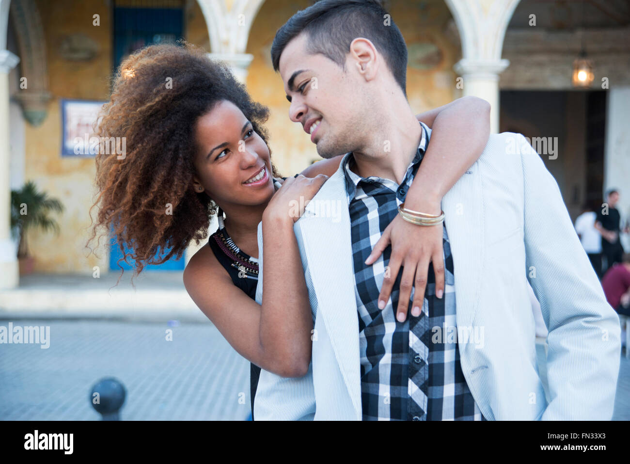 Latin couple outdoors Stock Photo - Alamy