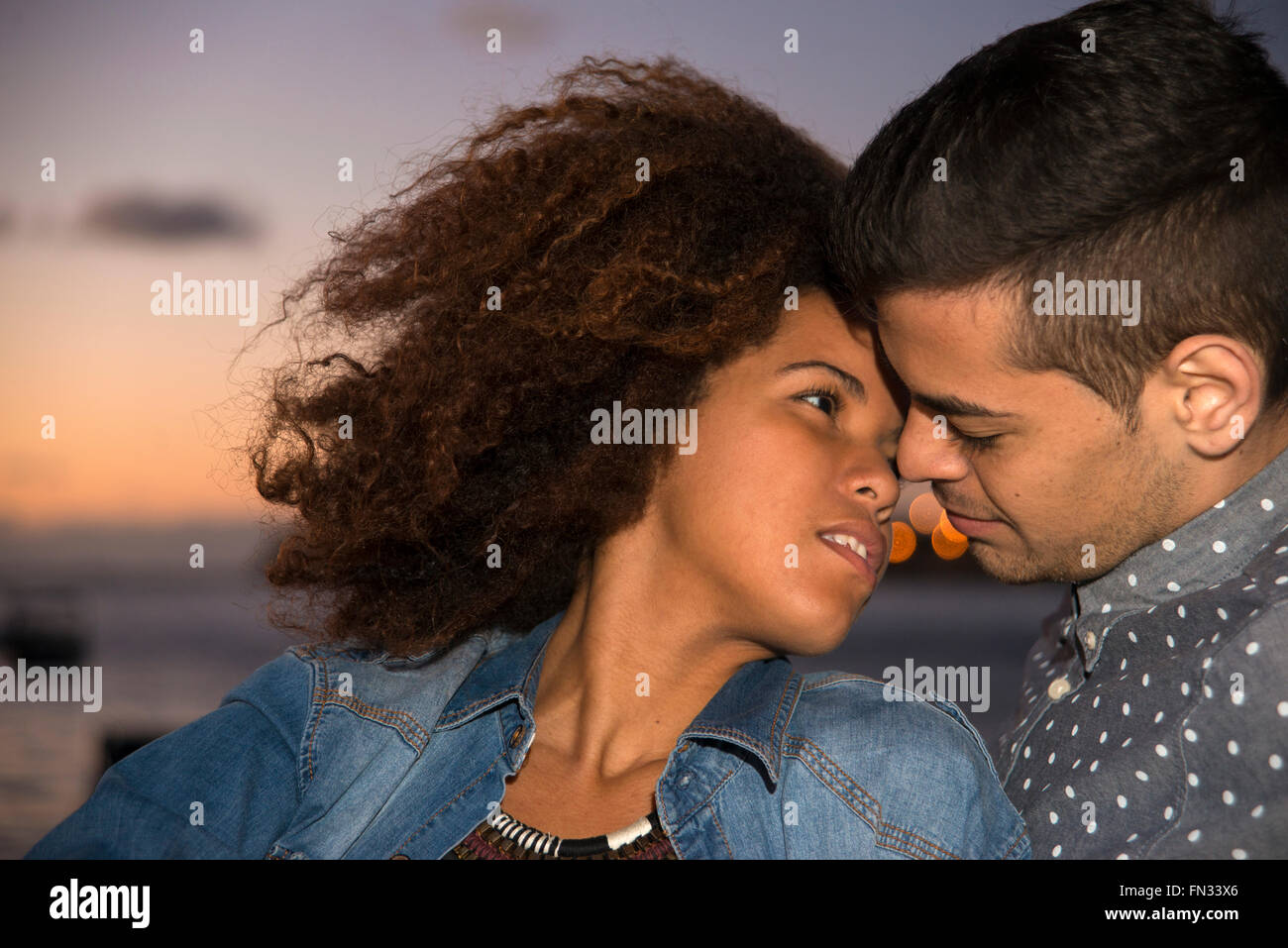 Latin couple outdoors Stock Photo - Alamy