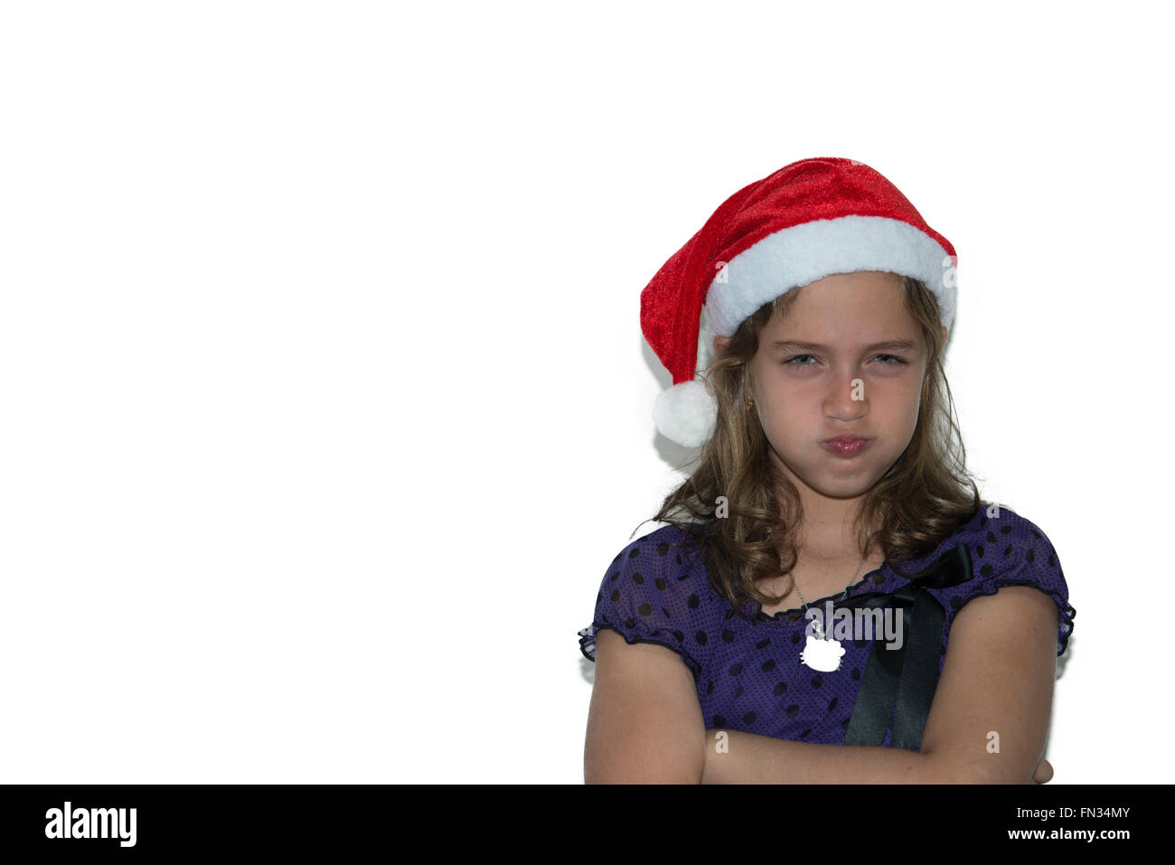 Little girl with Santa hat Stock Photo - Alamy