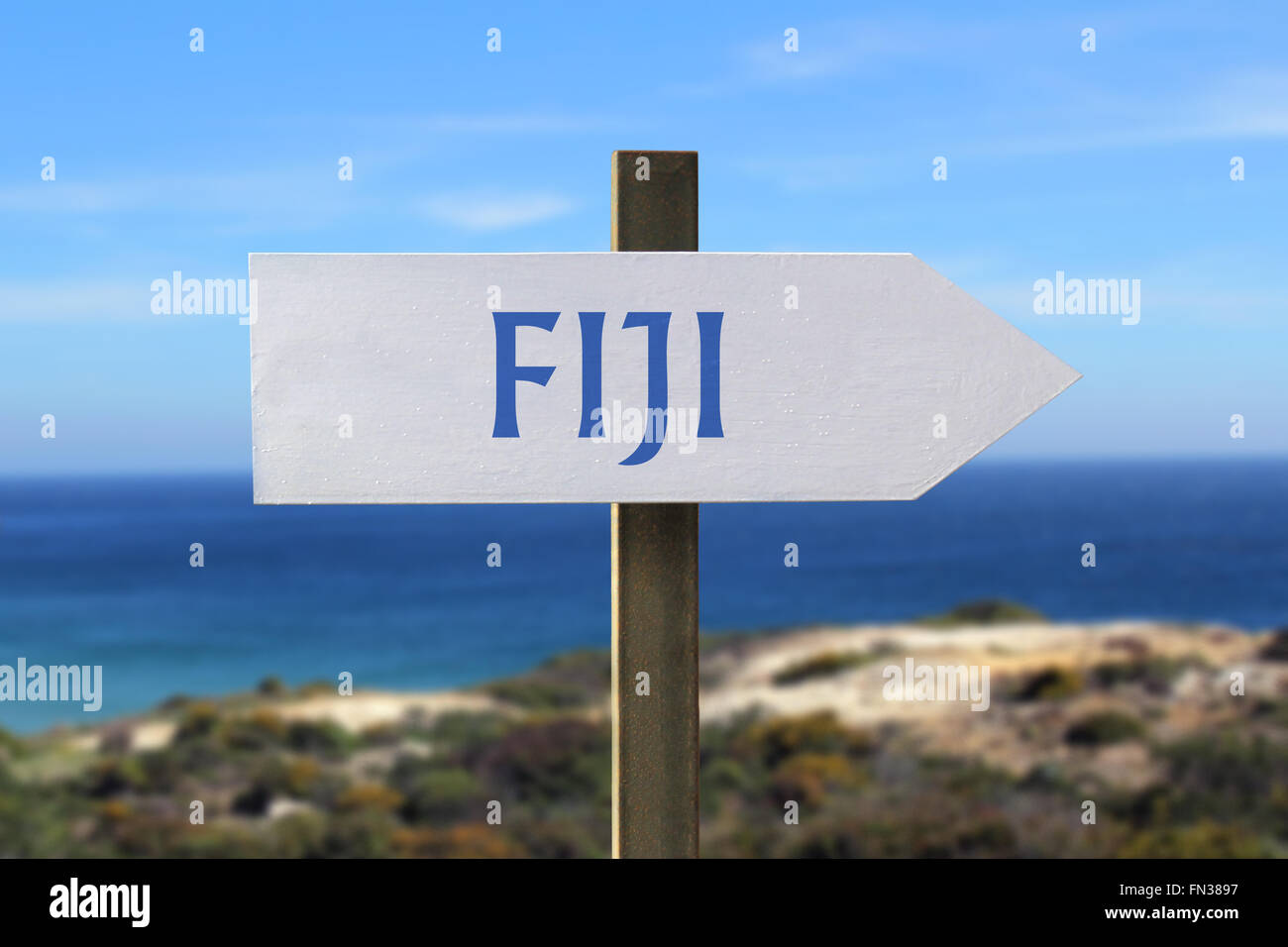 Fiji road sign with seashore in the background Stock Photo - Alamy