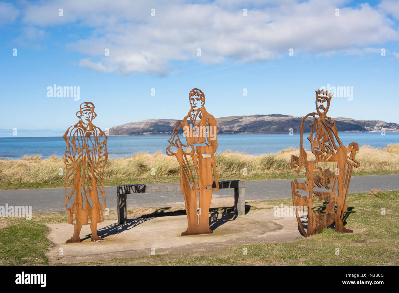 Rusty steel statues by Conwy Morfa sands Stock Photo - Alamy