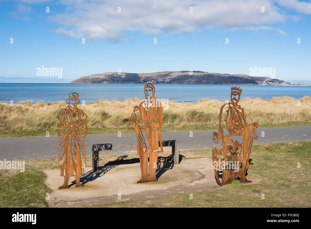Rusty steel statues by Conwy Morfa sands Stock Photo - Alamy