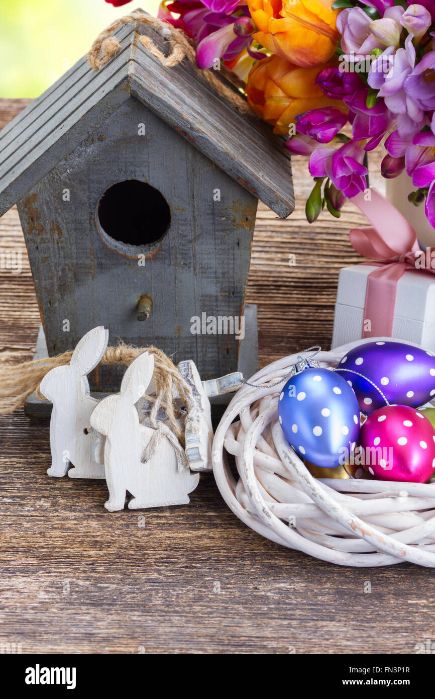 Spring rabbits with easter eggs Stock Photo - Alamy