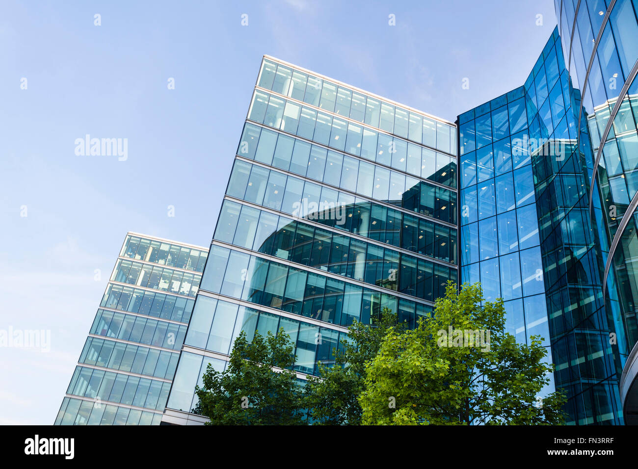 Several modern glass buildings near City Hall in London Stock Photo - Alamy