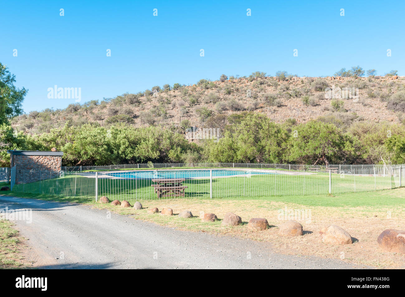 A fenced picnic area with swimming pool in the Mountain Zebra National ...