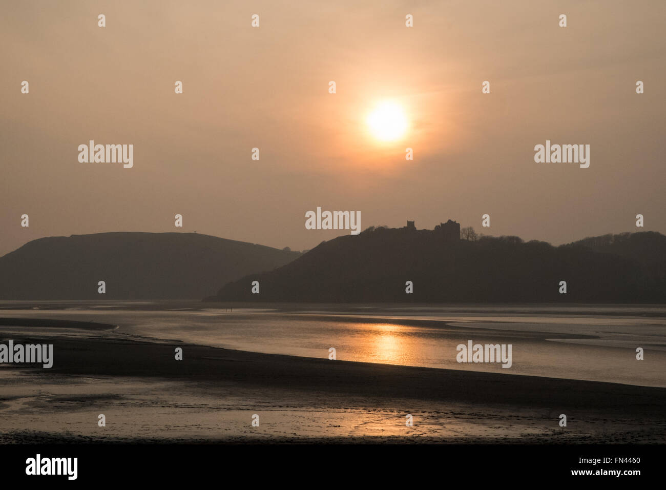 Llanstephan Castle from Ferryside,Beach sunset,Carmarthenshire,Wales,U ...