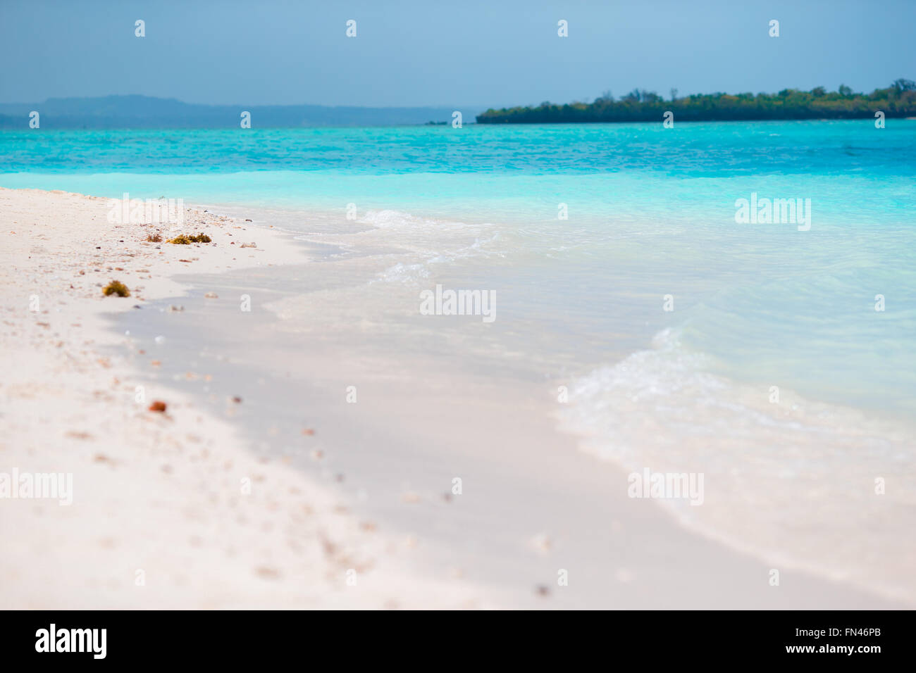 Idyllic perfect turquoise water at exotic island Stock Photo - Alamy