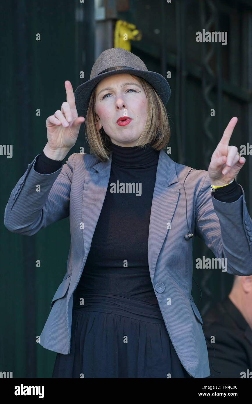 London, UK. 13th March, 2016. A ladies doing a Sign Language at the St ...