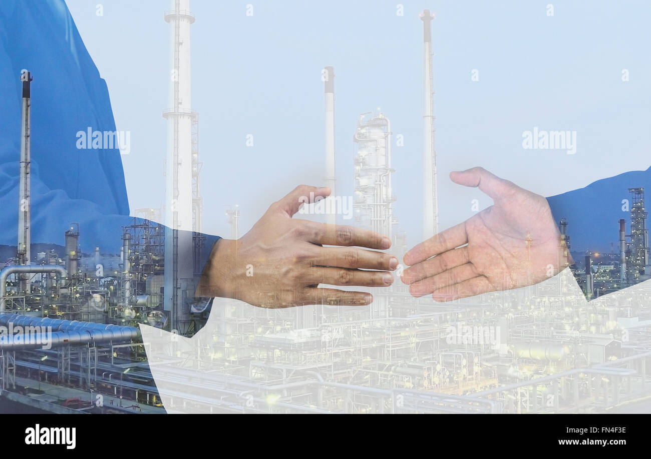 shakehands and rig double exposure concept Stock Photo - Alamy
