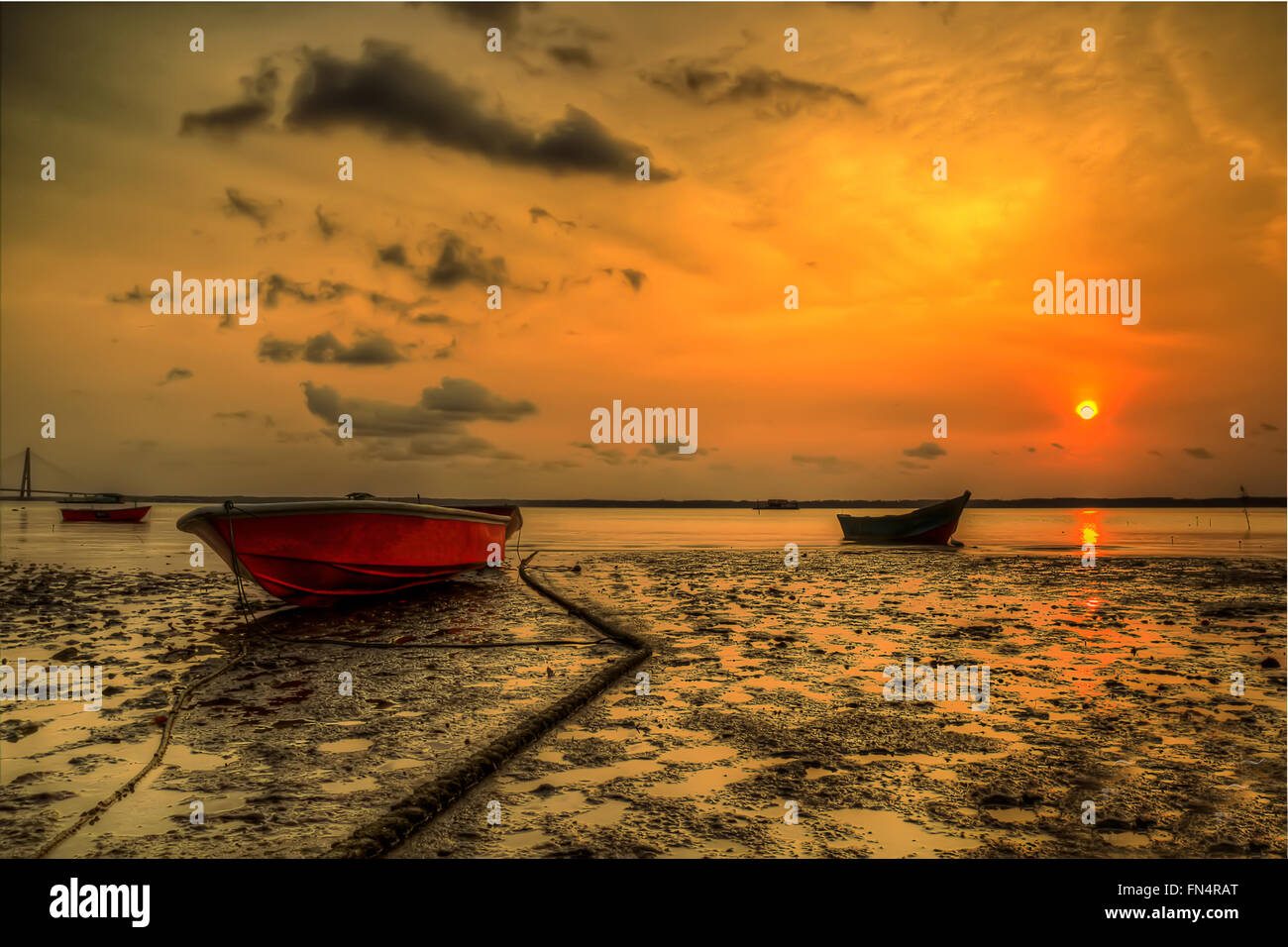 boat at beach in sunset view Stock Photo - Alamy