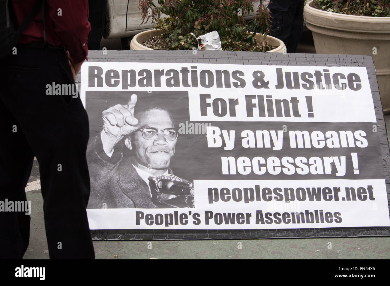 New York, USA. 13th March 2016. A sign calling for reparations for ...