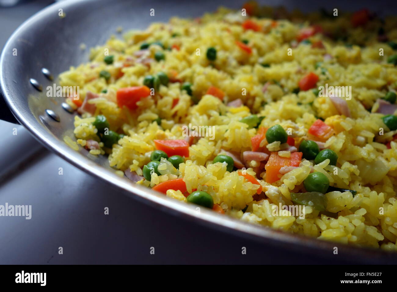 Ham and Vegetable Saffron Fried Rice Stock Photo - Alamy