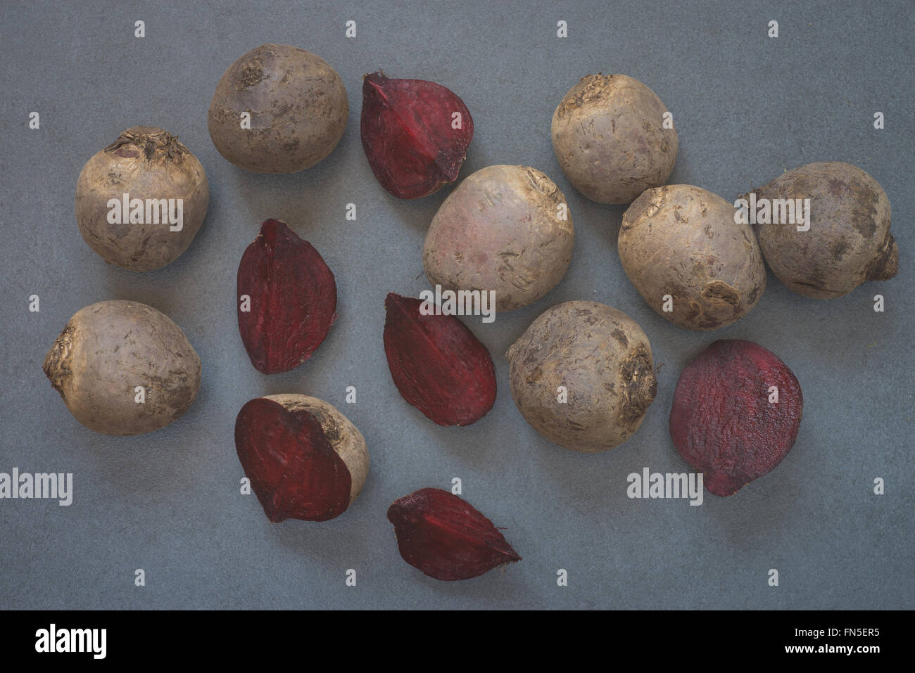 group of fresh raw beetroots on table Stock Photo - Alamy