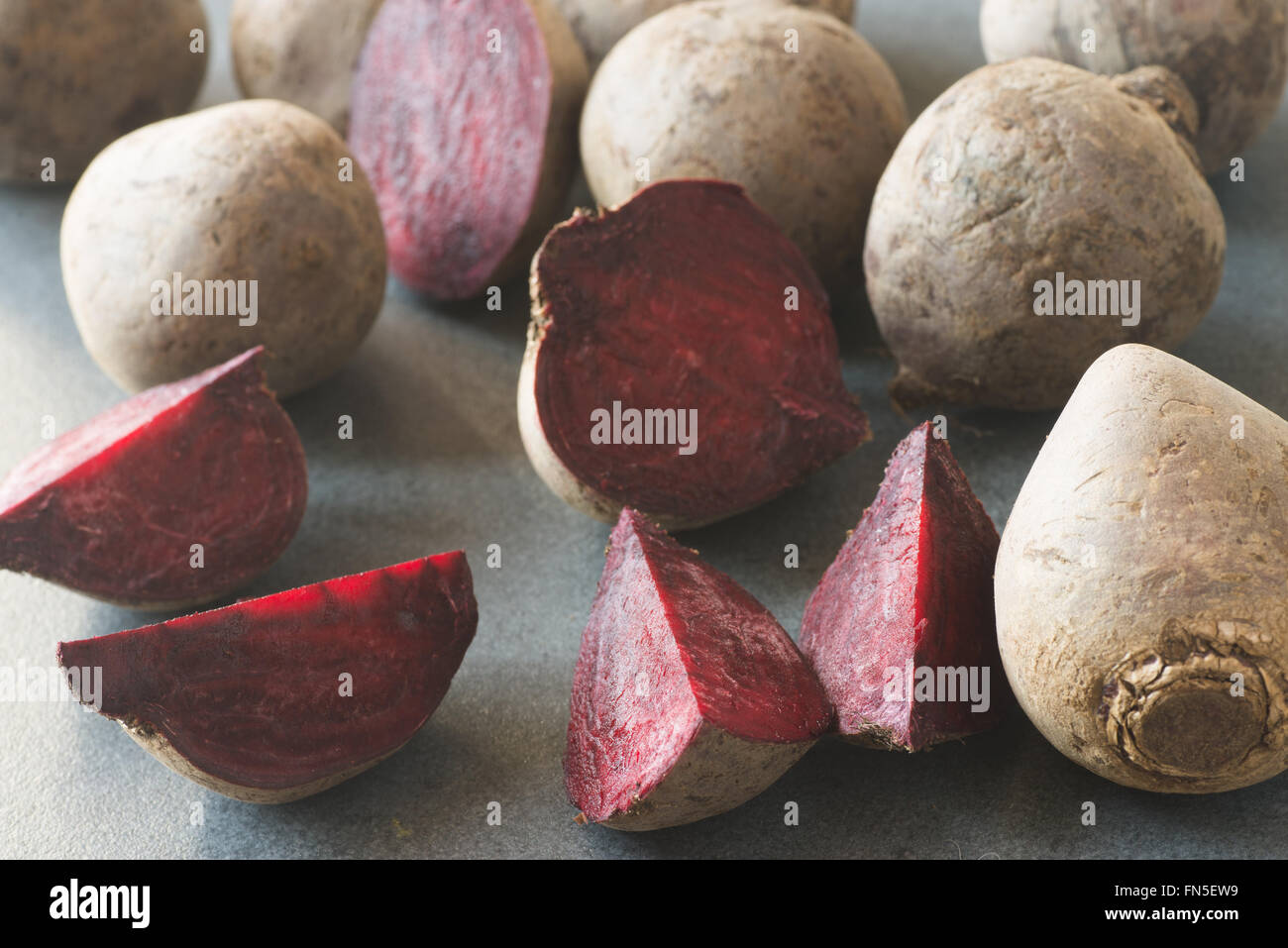 group of fresh raw beetroot on table Stock Photo - Alamy