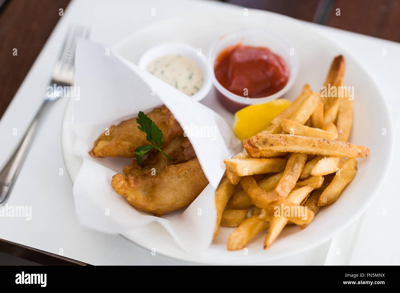 Delicious Western style fish and chips dish Stock Photo - Alamy