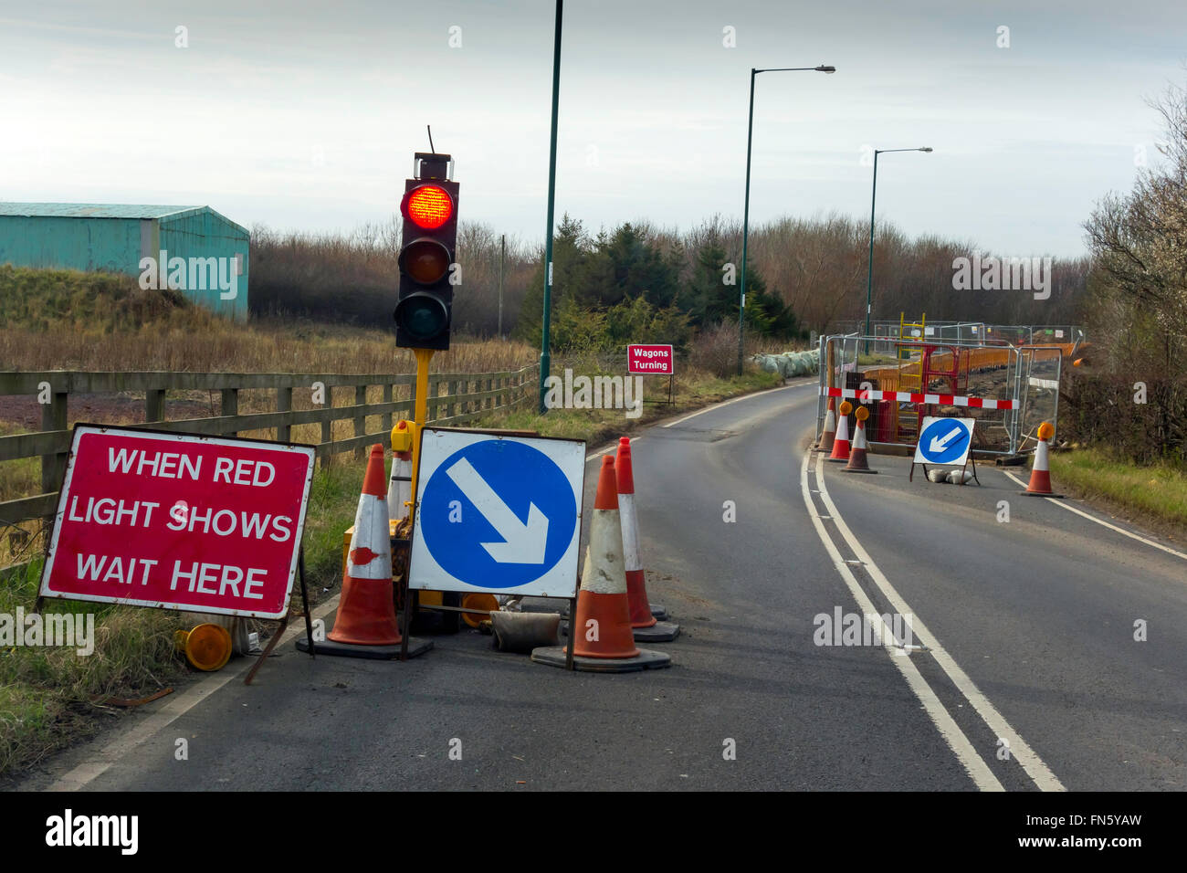 Traffic light controlled entrance to single lane road working during ...