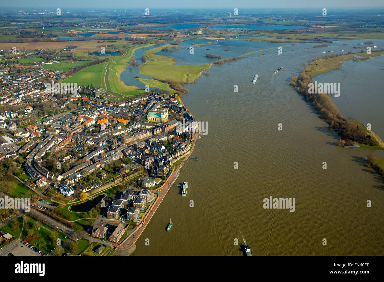 Aerial view, overlooking the Rhine at Rees with St. Assumption Catholic ...