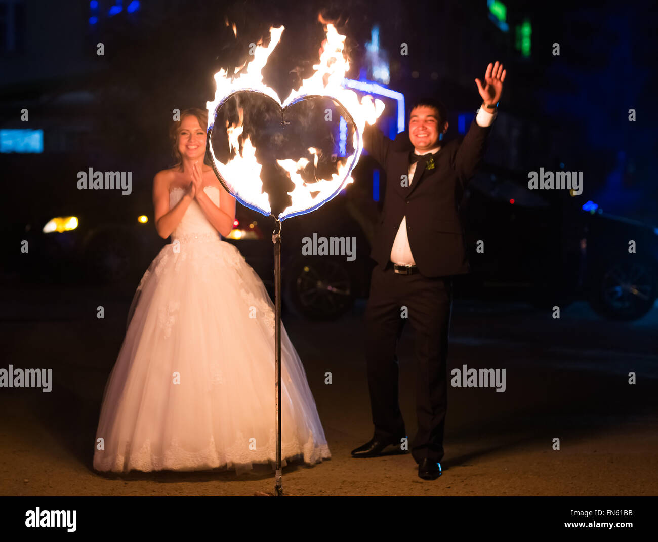 set fire to the couple on their wedding heart Stock Photo - Alamy