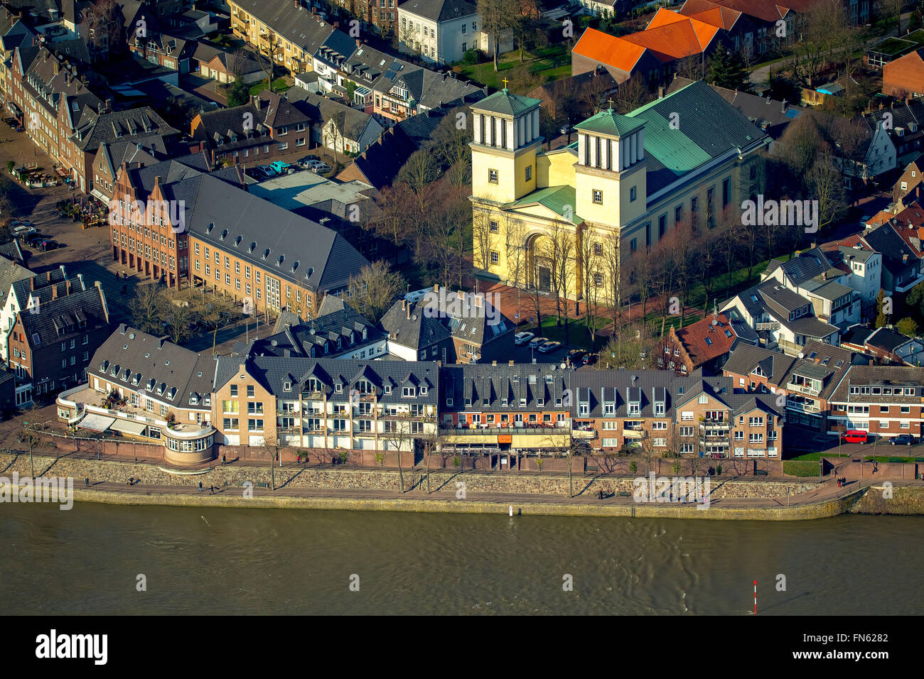 Aerial view, overlooking the Rhine at Rees with St. Assumption Catholic ...