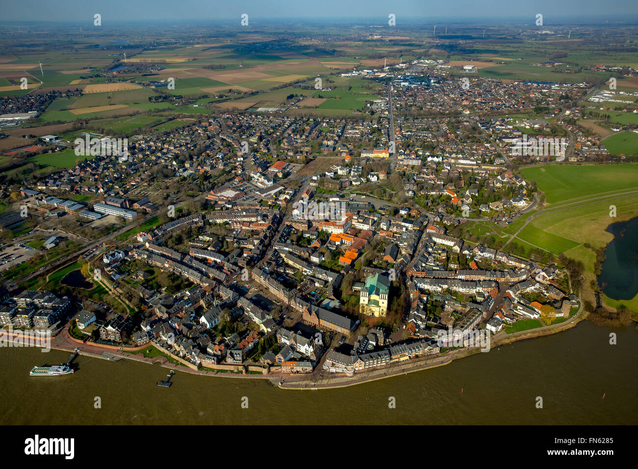 Aerial view, overlooking the Rhine at Rees with St. Assumption Catholic ...