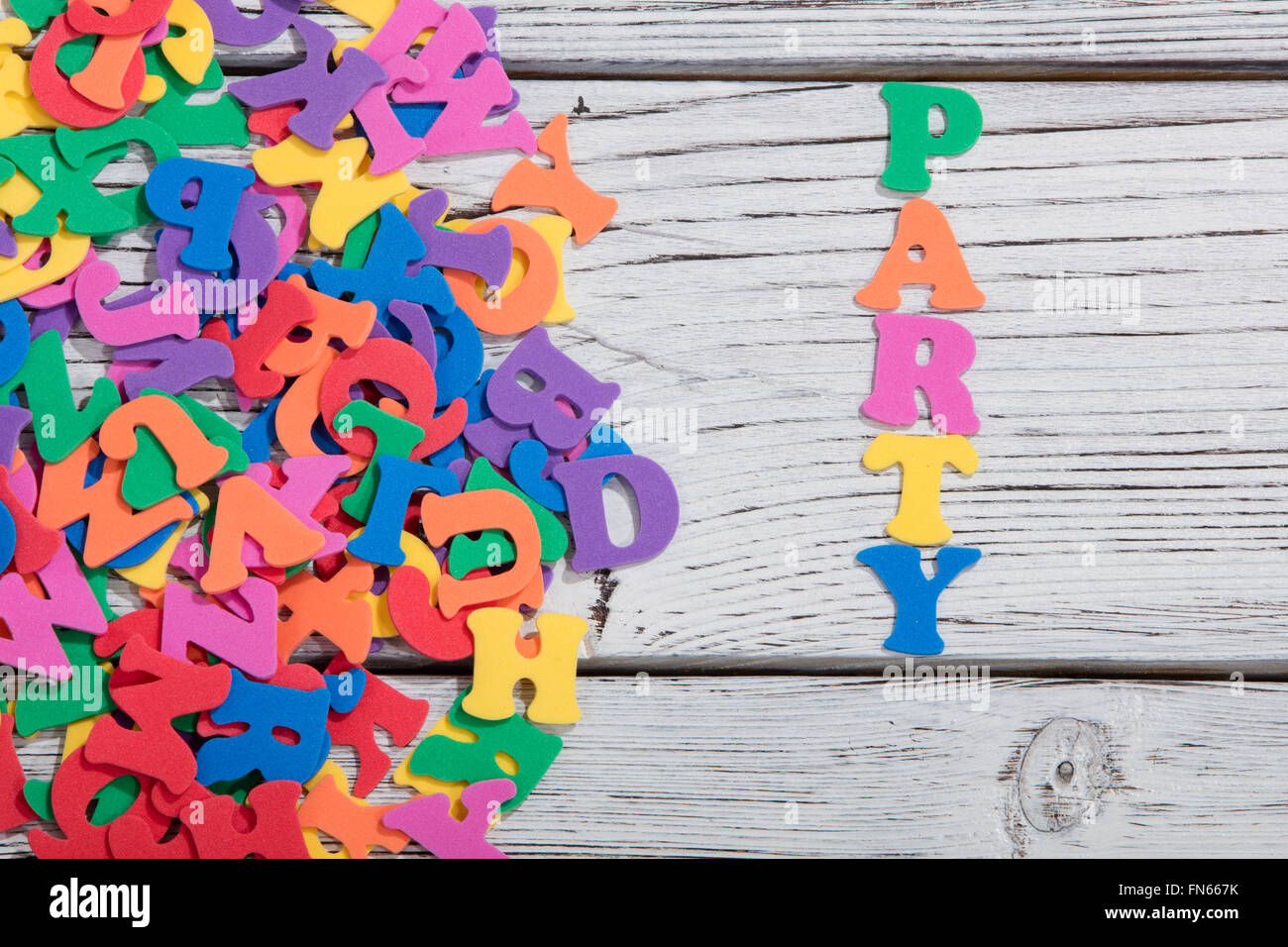 colorful words on white wooden background Stock Photo - Alamy