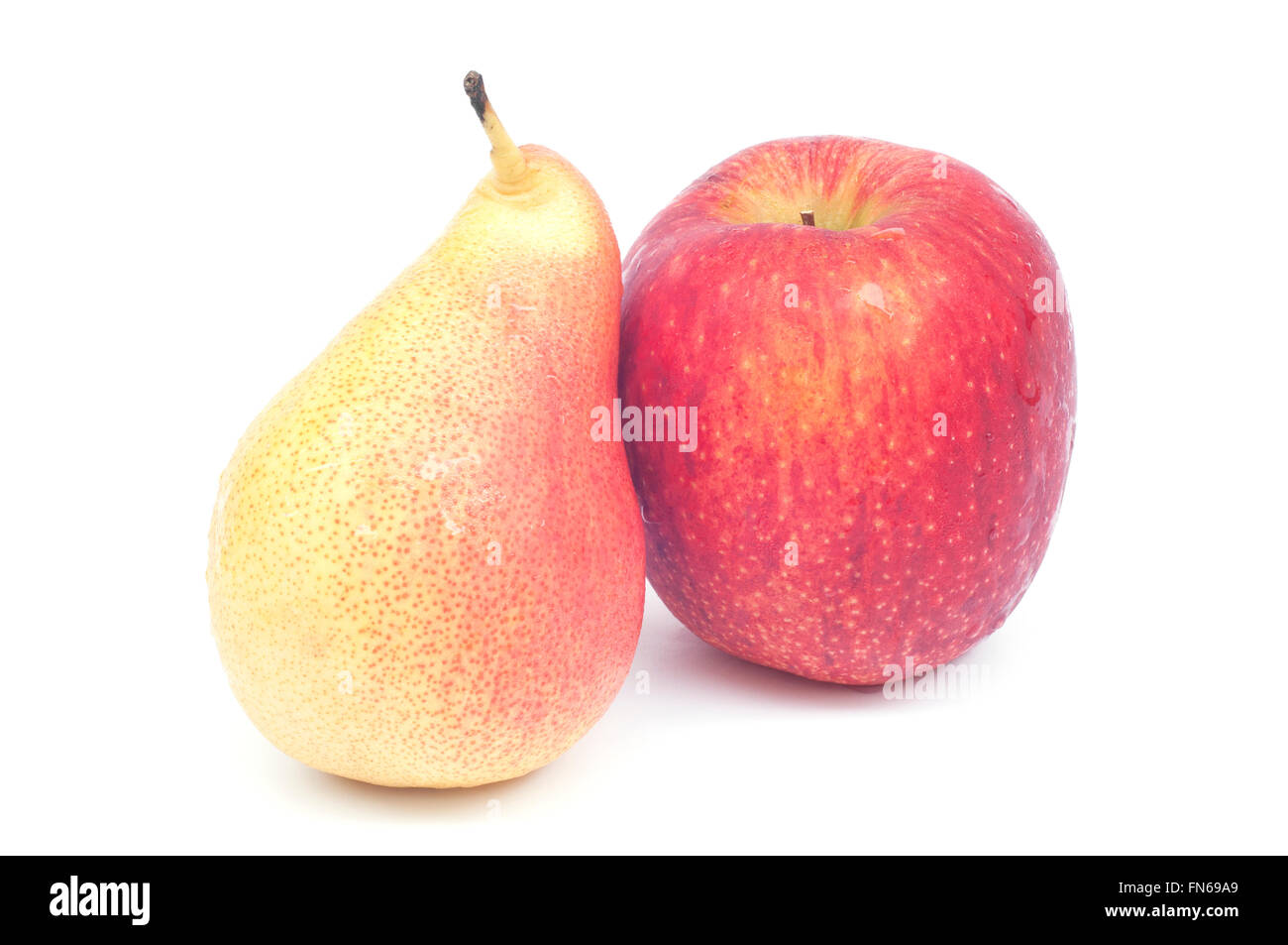 Pear and apple isolated Stock Photo - Alamy