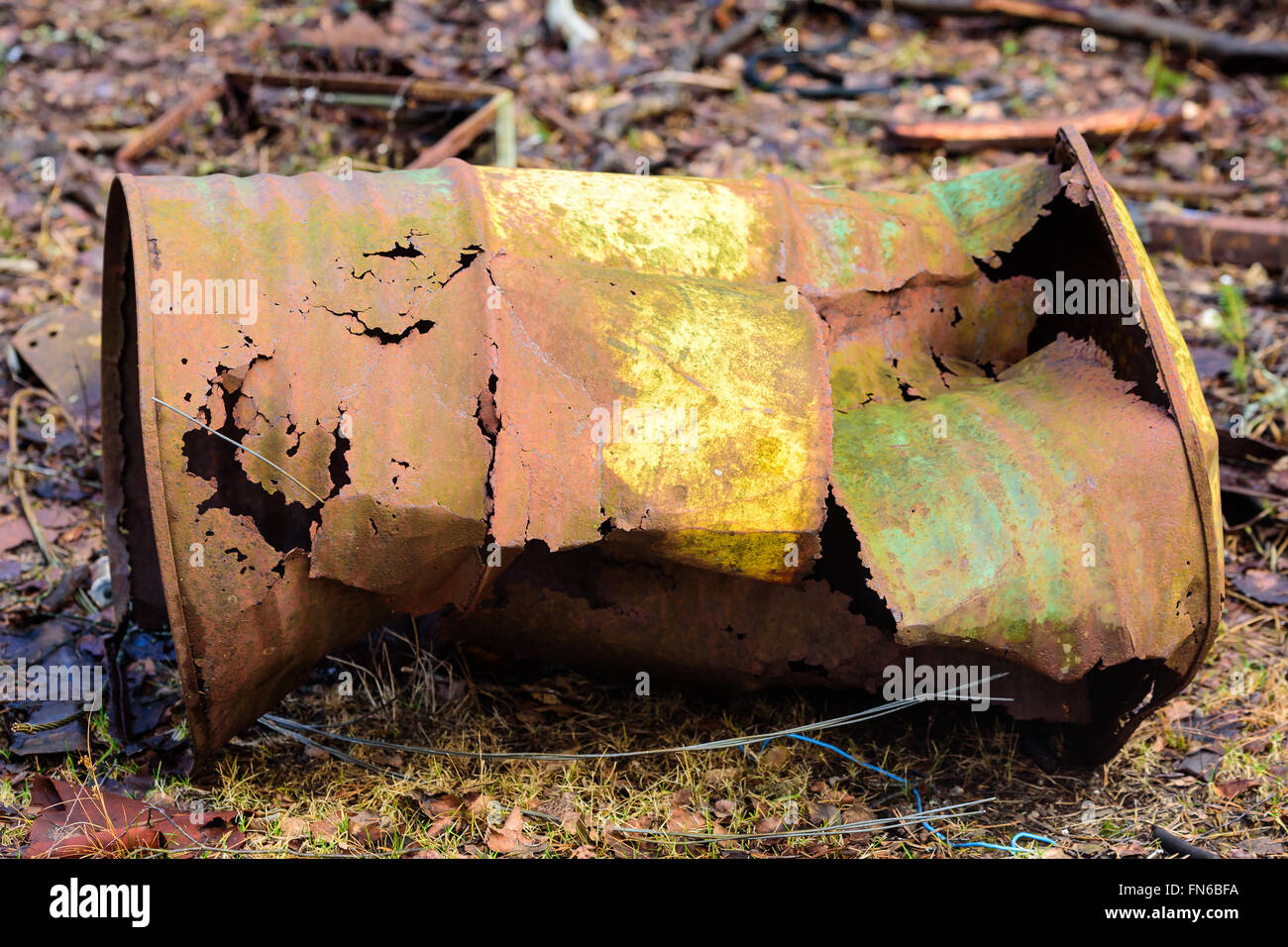 An old and very degraded oil barrel left in nature to rust Stock Photo ...