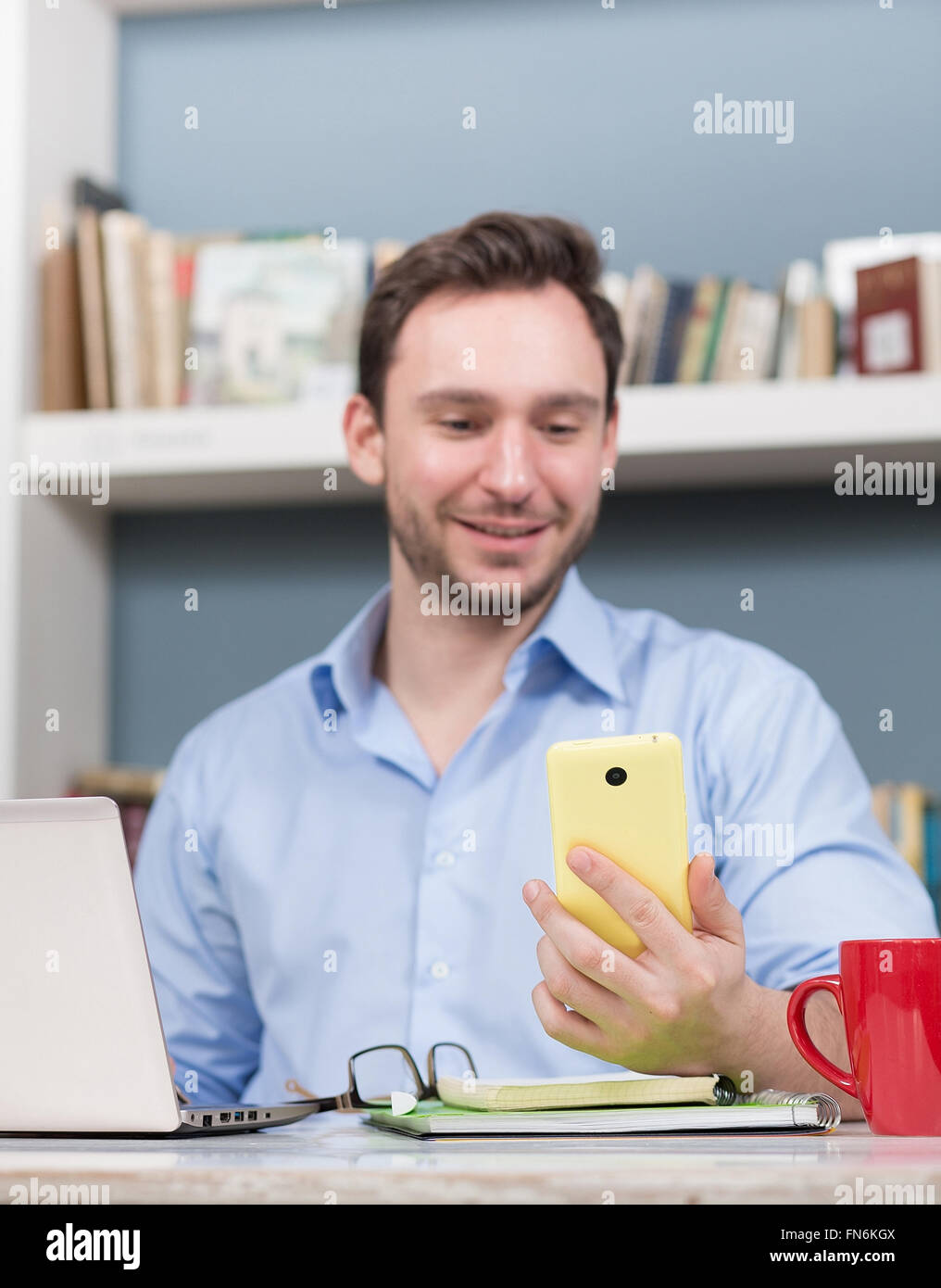Student in library Stock Photo - Alamy