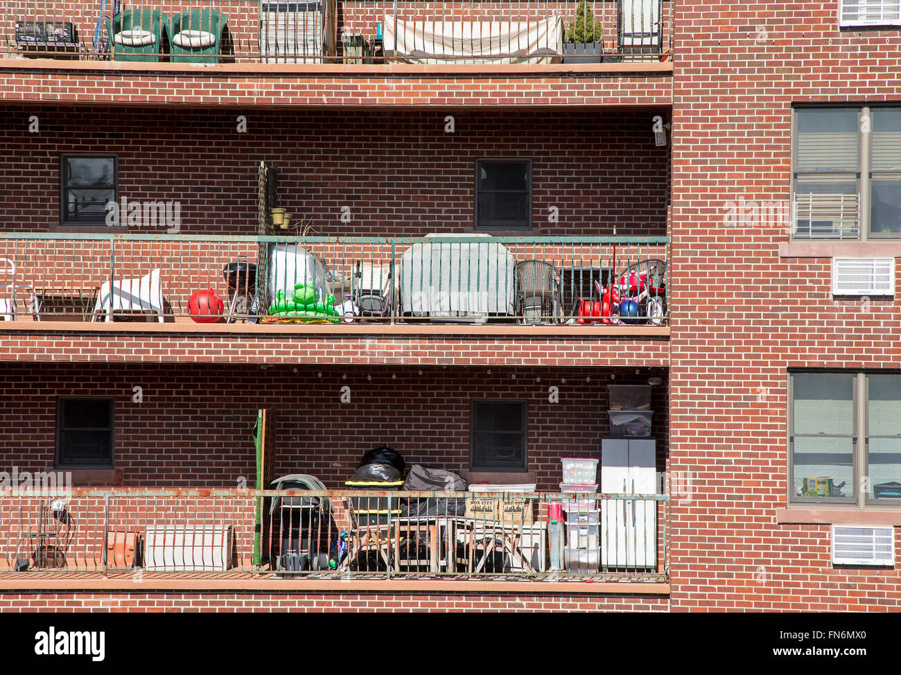 Items on the balconies of an apartment building Stock Photo - Alamy