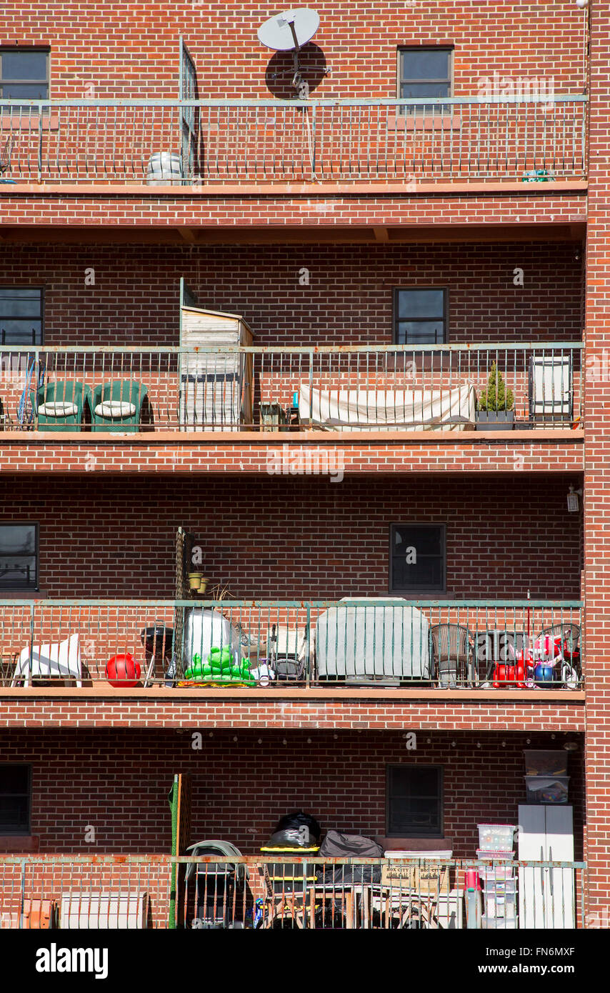 Items on the balconies of an apartment building Stock Photo - Alamy