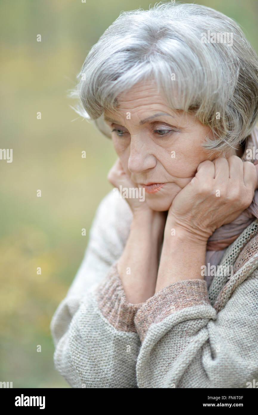 Nice sad old woman Stock Photo - Alamy