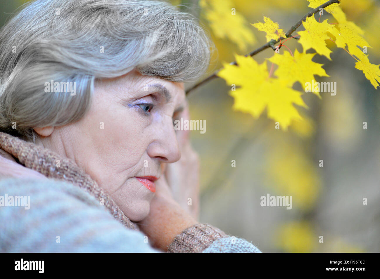 Nice sad old woman Stock Photo - Alamy