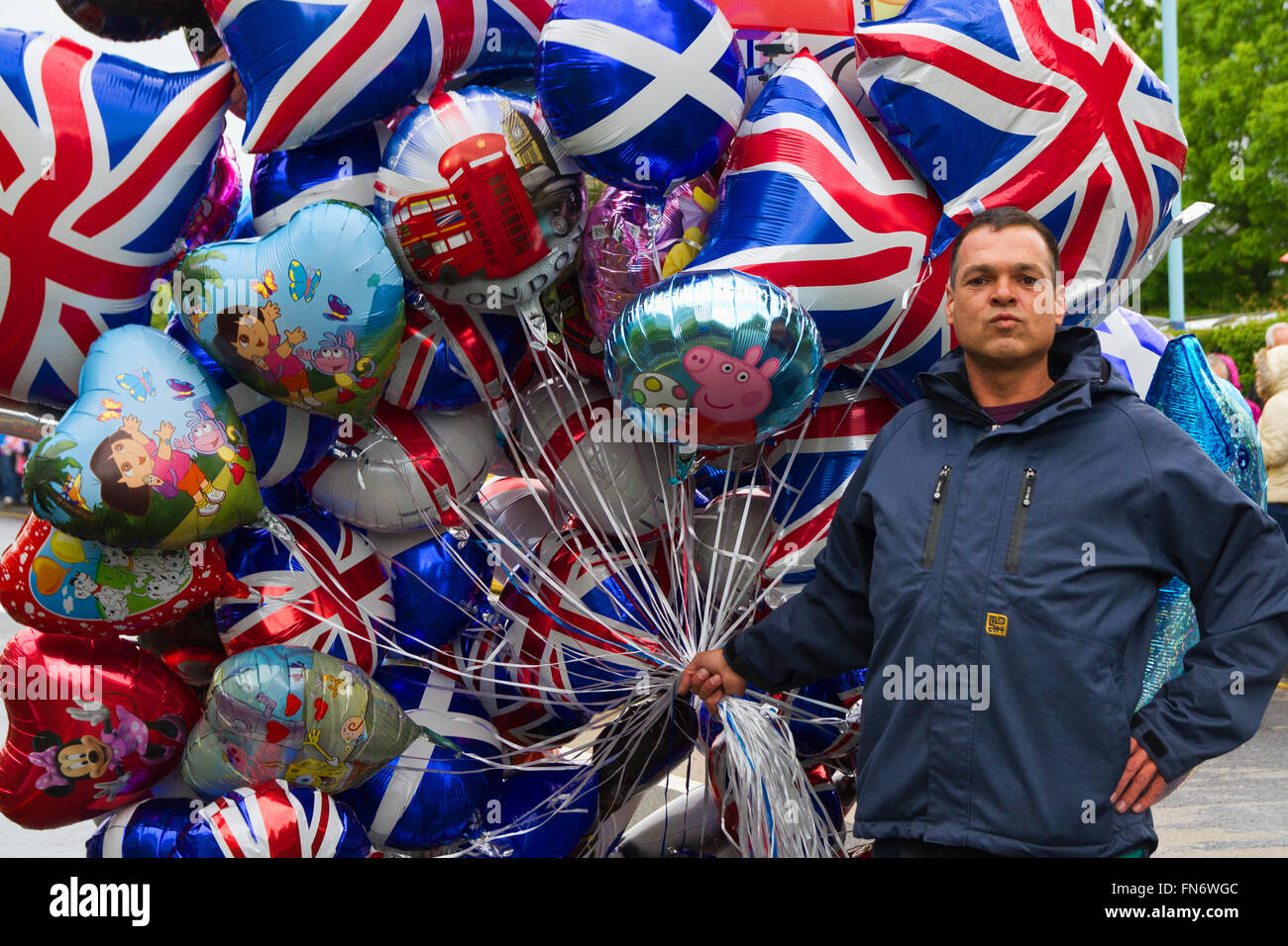 Balloon seller as the Olympic torch relay for the 2012 London Olympics ...