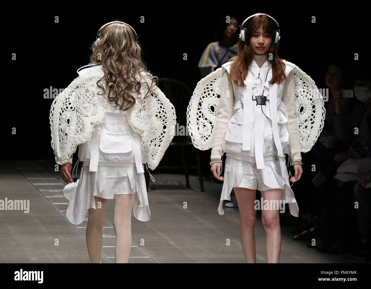 Tokyo, Japan. 14th Mar, 2016. Models display creations designed by ha ...
