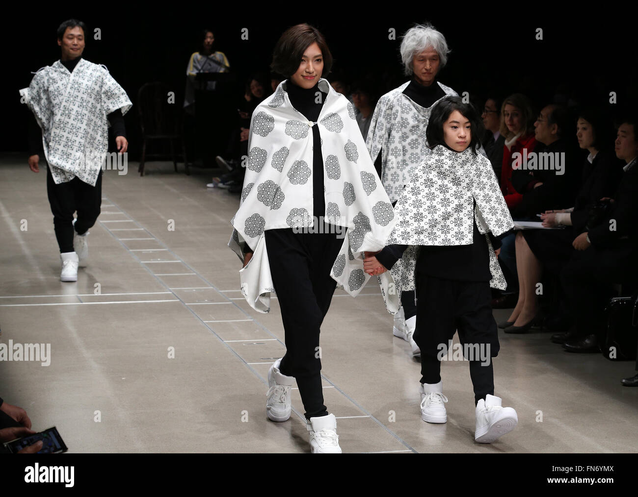 Tokyo, Japan. 14th Mar, 2016. Models display creations designed by ha ...