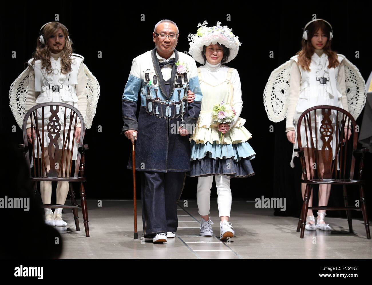 Tokyo, Japan. 14th Mar, 2016. Models display creations designed by ha ...