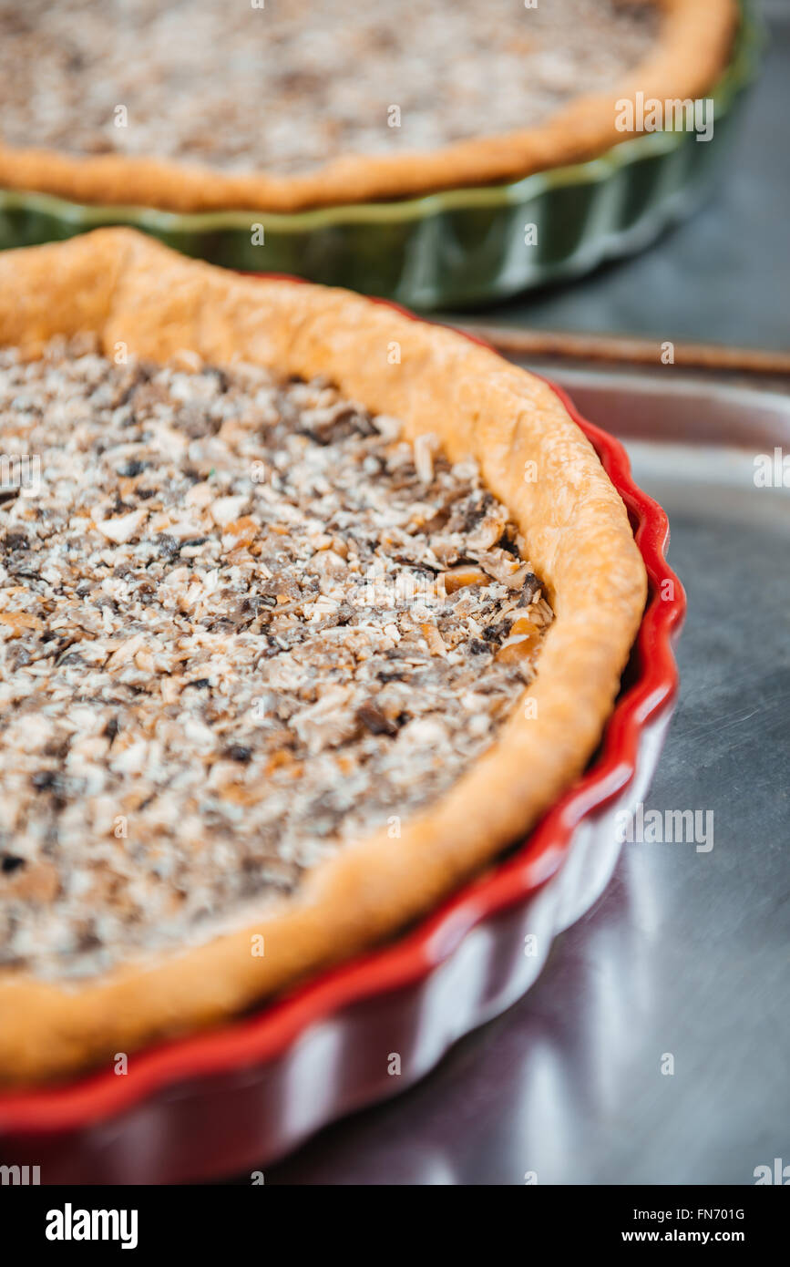 Closeup of two pies with filling in process of cooking Stock Photo - Alamy