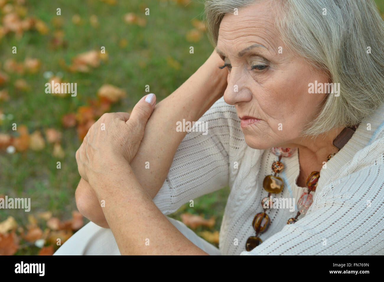 Nice sad old woman Stock Photo - Alamy