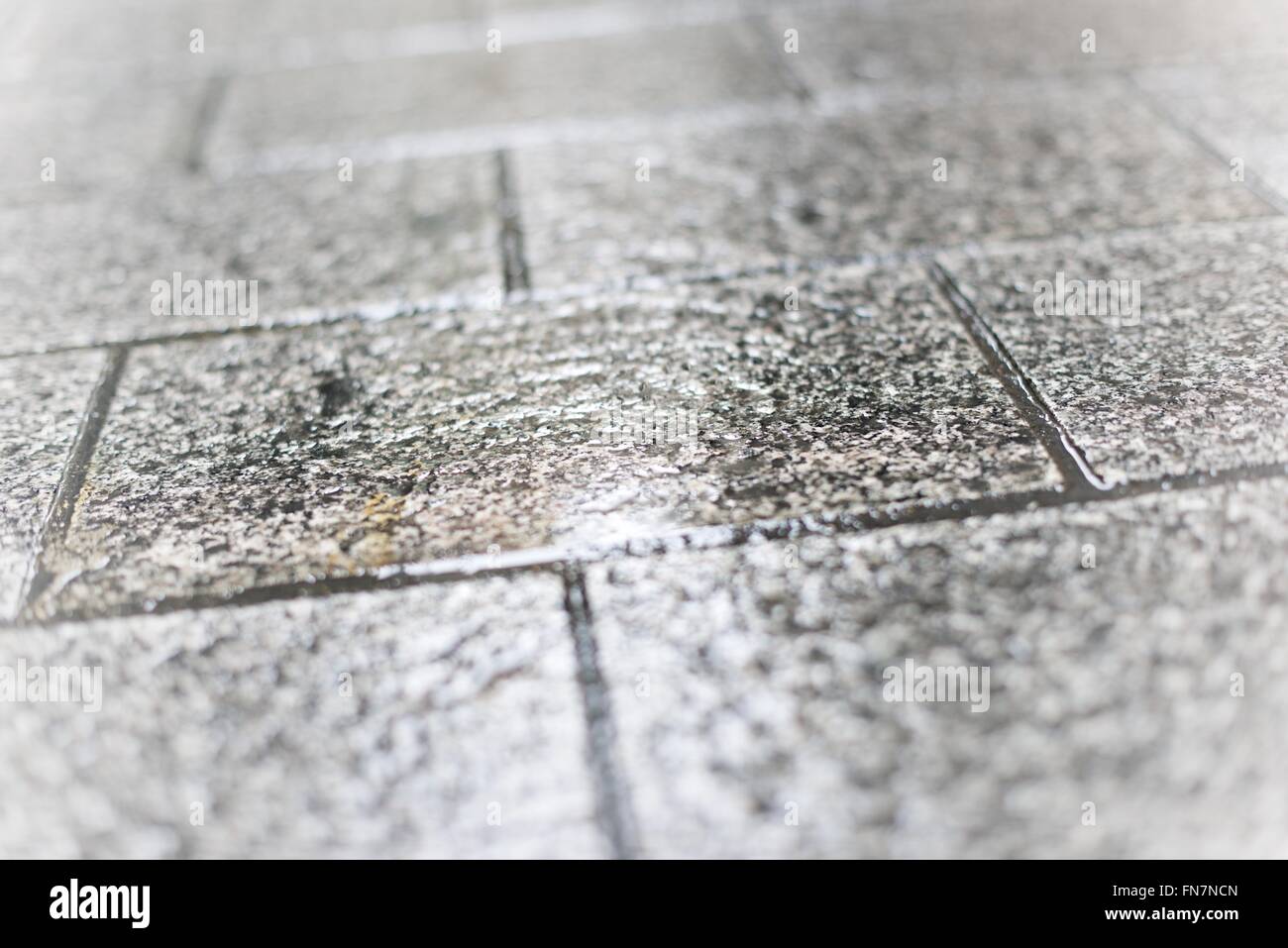 Floor of a street with stone tiles Stock Photo - Alamy