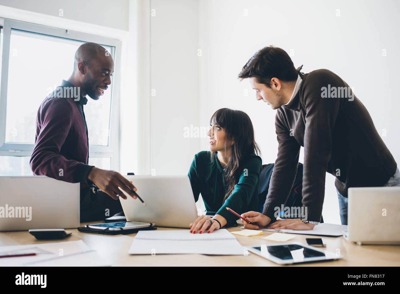 Multiracial business people working together connected with ...