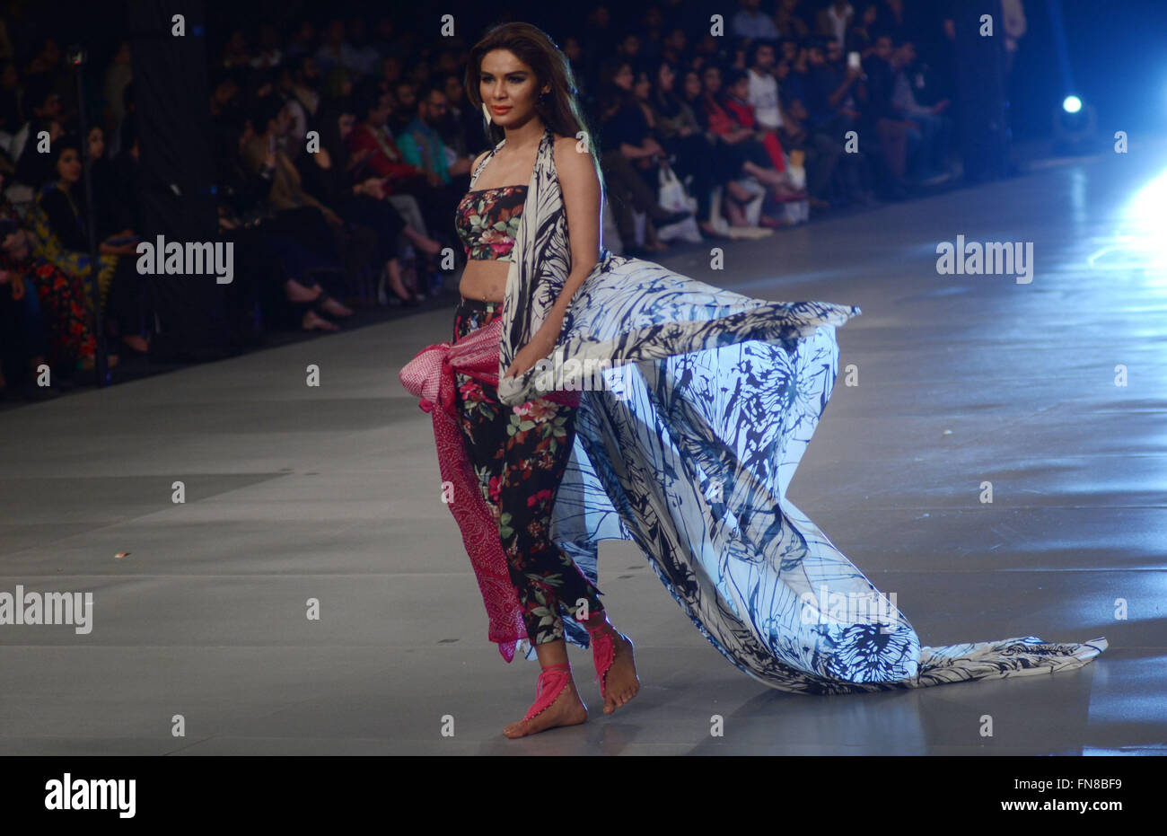 Lahore, Pakistan. 13th Mar, 2016. Pakistani model presents creations of ...