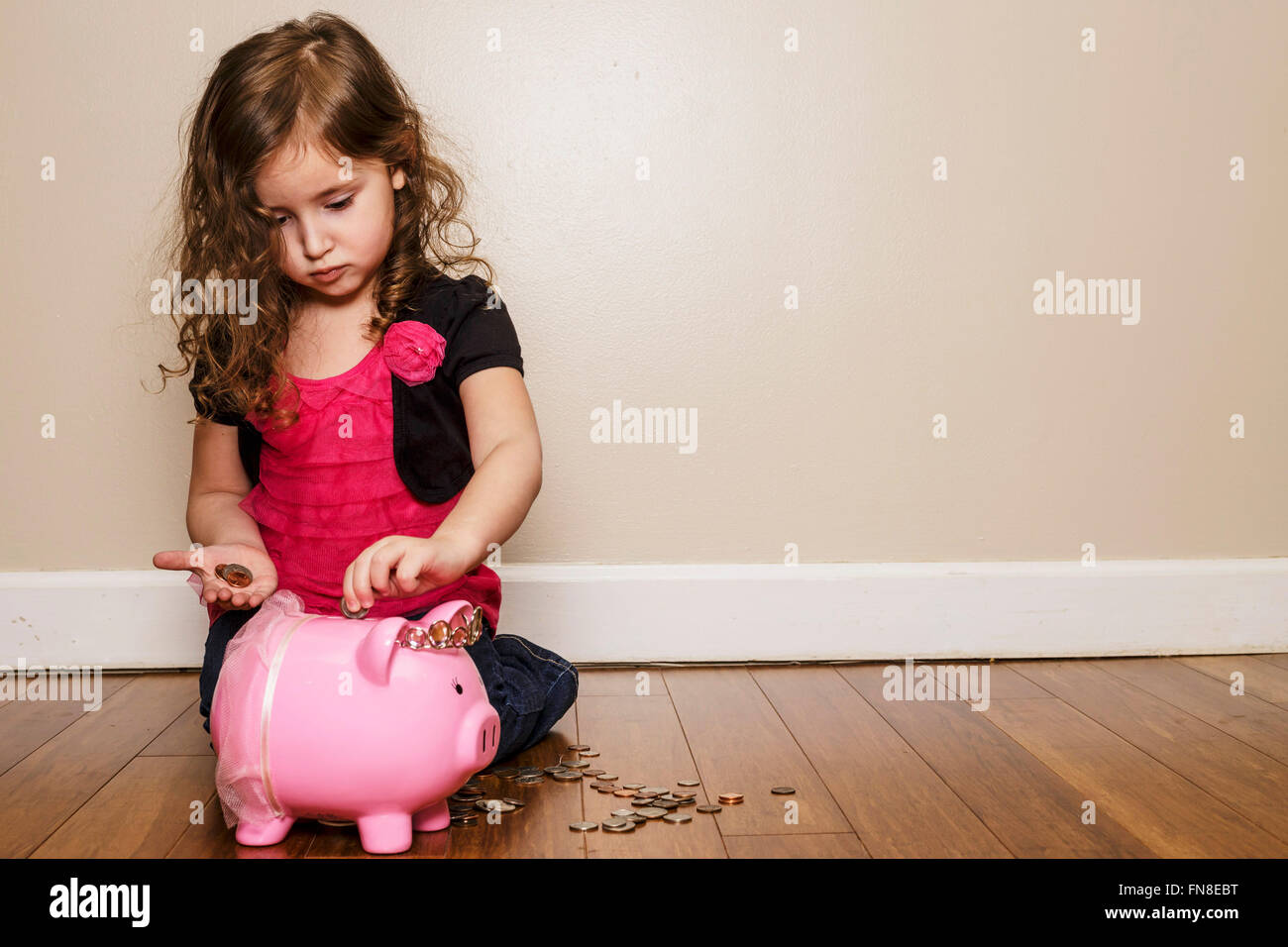 Girl saving money hi-res stock photography and images - Alamy