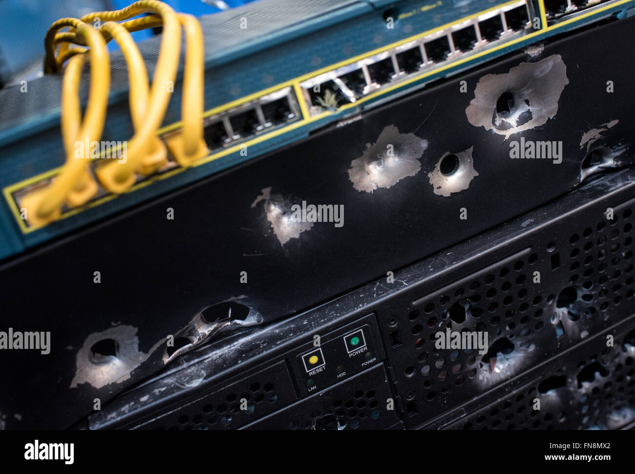 Hanover, Germany. 14th Mar, 2016. Decorative bullet holes in a server ...