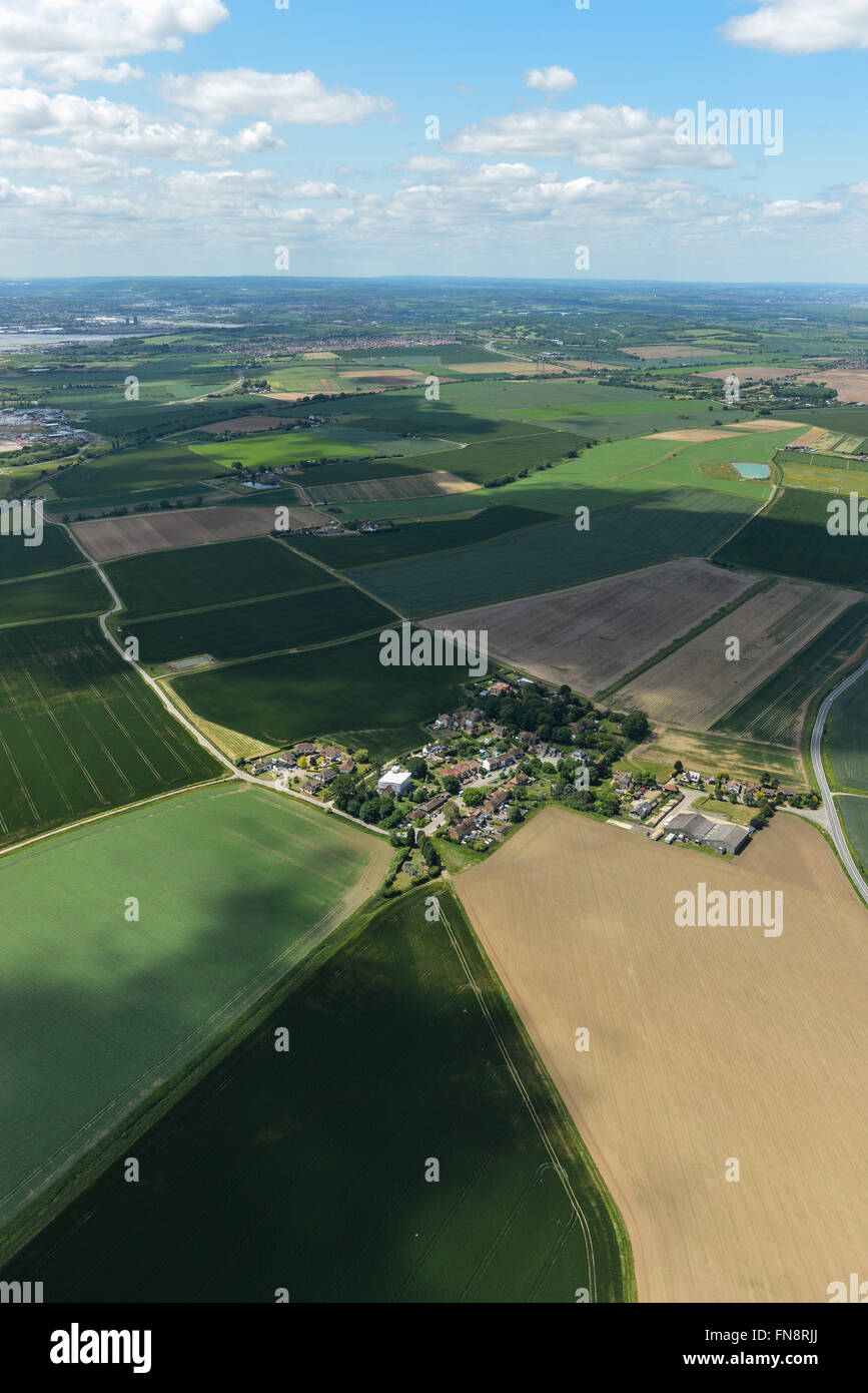 An aerial view of the Kent village of Stoke and surrounding countryside ...