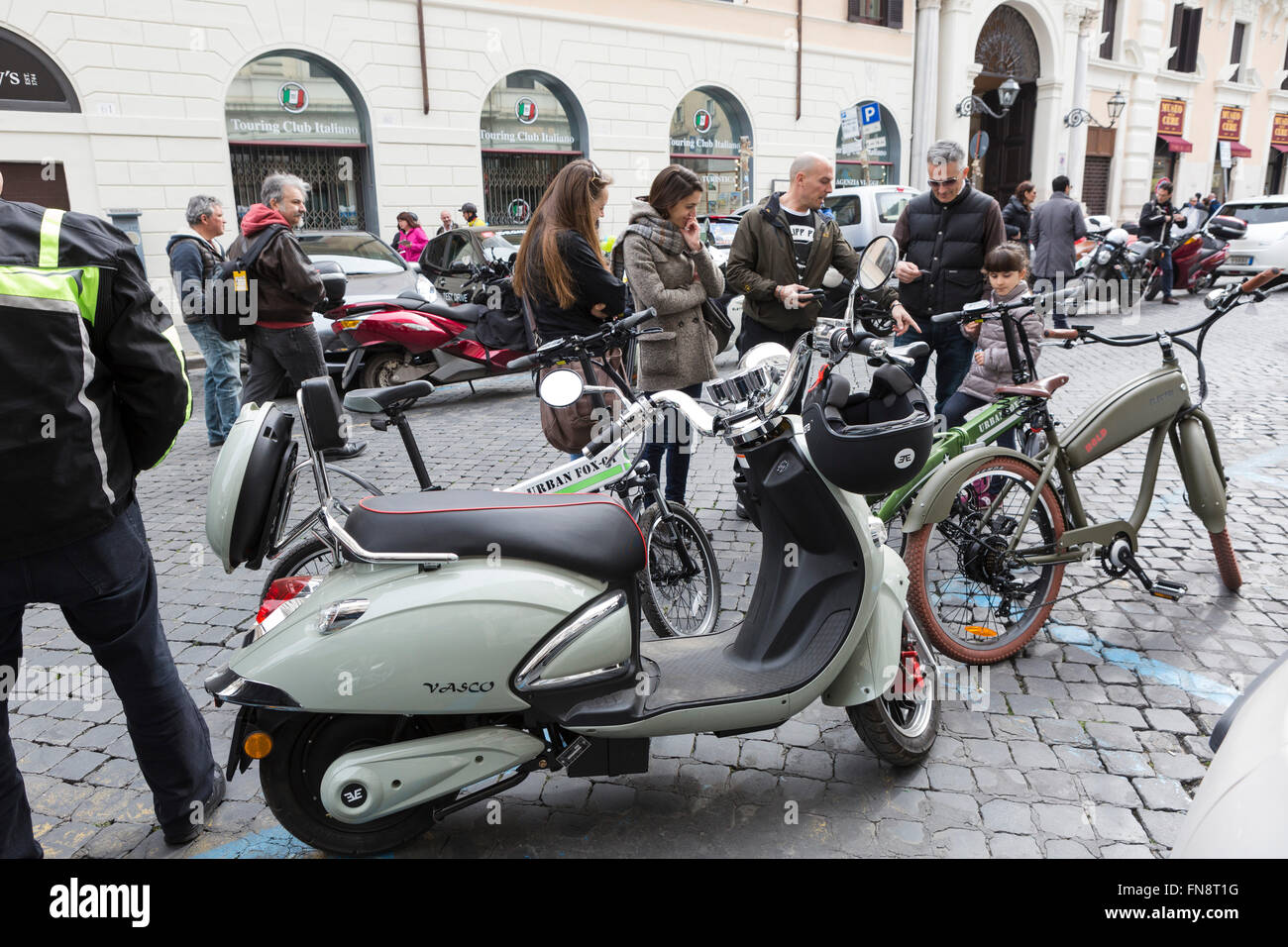 Electrically powered scooter and bicycle in Rome Stock Photo - Alamy