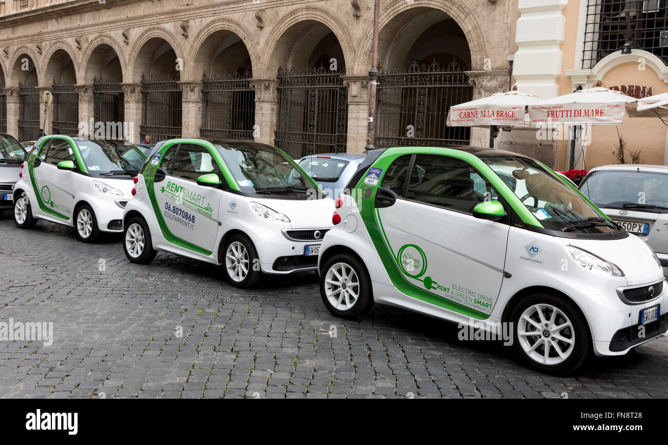 Flash mob of Electric cars. Row of electrically powered Smart cars ...